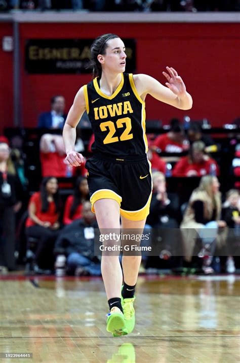 Caitlin Clark Of The Iowa Hawkeyes Runs Down The Court During The