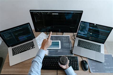 Programmer Typing Code On Desktop Computer Developing Programming And