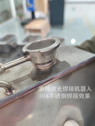 冰箱门铰链激光焊接机器人 常州泰翔自动化设备科技有限公司