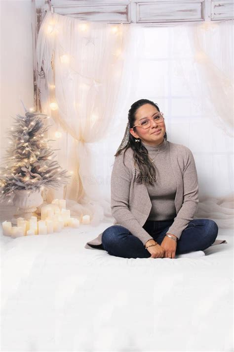 Year Old Latina Woman With Glasses And Santa Hat Next To The Decorated Tree Is Excited To