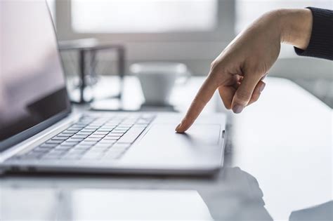 Premium Photo A Detailed View Of Female Hands Typing On A Cuttingedge