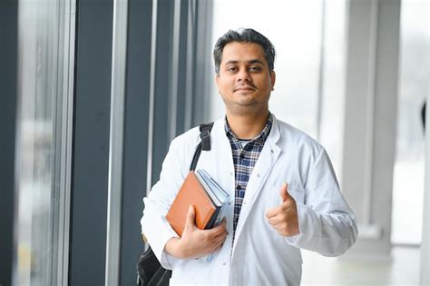 Premium Photo Portrait Of A Young Doctor Student Studying