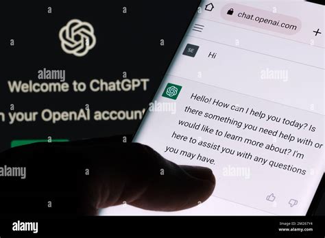 chatgpt chat bot screen seen on smartphone and laptop display with chat