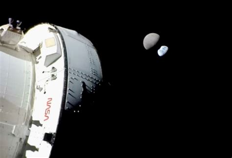 Orion Capsule Watches Moon Eclipse Earth At Treks Farthest Point