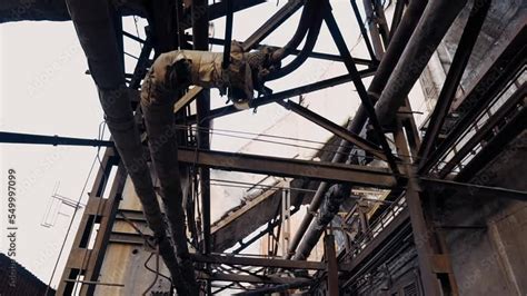 Rusty Metal Pipes Structures In An Abandoned Factory The Ruins Of A Thermal Power Plant For