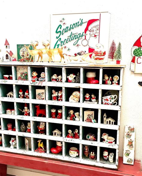 Large Cubbie Shelf With Christmas Figurines Decoration