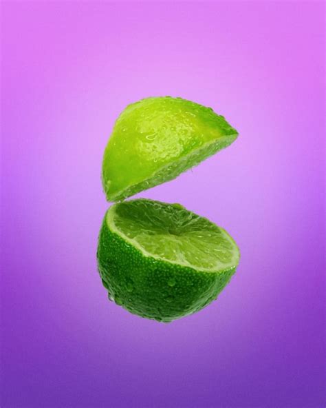 Premium Photo A Lime With A Bite Taken Out Of It
