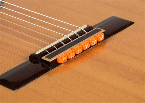 How To Tie Classical Guitar Strings Audiolover