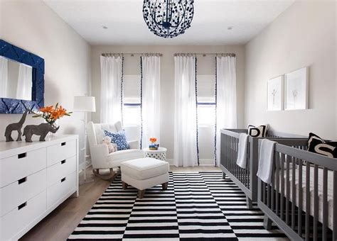 Blue And Gray Twins Nursery Design With Side By Side Cribs