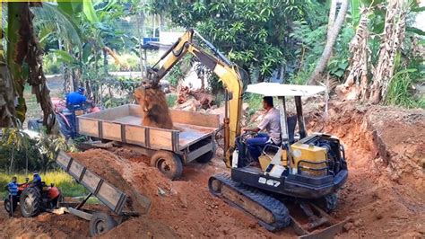 එකසකවට එකන දන වඩ Excavator Loading Tractor Load and unload soil from excavator to