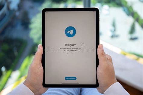 Man Hand Holding IPad Air Space Gray With Service Telegram Editorial Photography Image Of