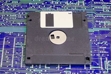 Floppy Disk Against Electronic Circuit Board Stock Photo Image Of Industry Computer