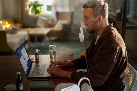 Premium Photo High Angle Sick Man Using A Nebulizer