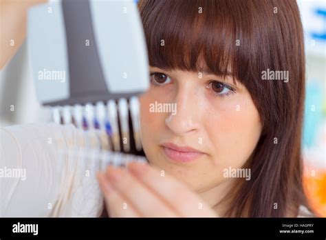 Woman Technician Use Pipette Stock Photo Alamy