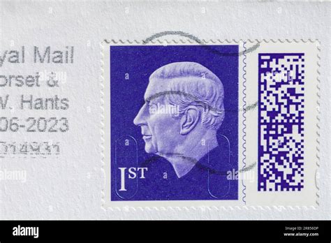 Purple 1st Class Stamp First Class Stamp With King Charles Iii Head Stuck On Envelope Stamp