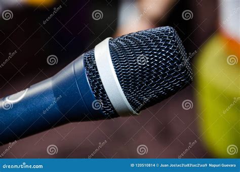 Microphone On Abstract Blurred Of Speech In Seminar Room Or Speaking Conference Hall Light Stock