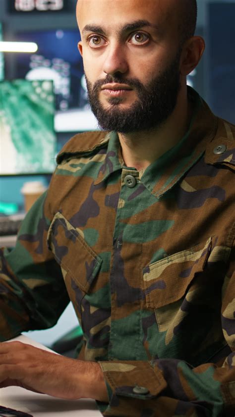 Vertical Special Forces Military Agent Working In Control Room Analyzing Aerial Reconnaissance