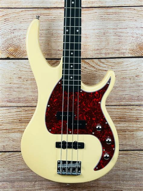Peavey Milestone 4 String Electric Bass Guitar Ivory