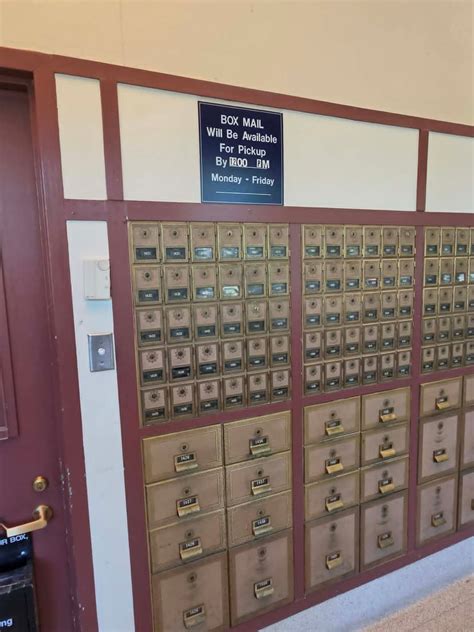 A Post Office Po Box Lobby With A Posted Mail Availability Time