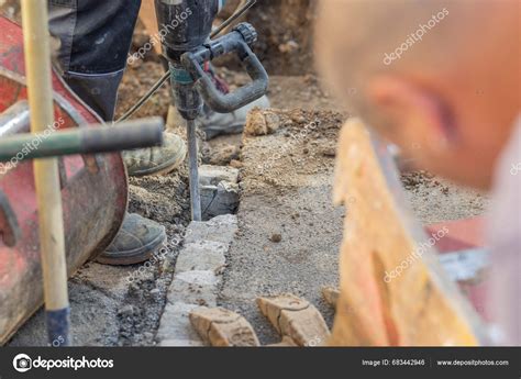 Men Using Sledgehammer Electric Chisel Remove Parts Floor Road Part Stock Photo By Psgt