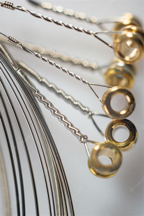 Premium Photo Macro Details Of Strings For Electric Guitar On A White