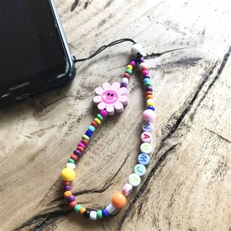 สายคล้องโทรศัพท์ลูกปัดสีสดใส สตูดิโอ 1000roads เชือก สายคล้อง Pinkoi