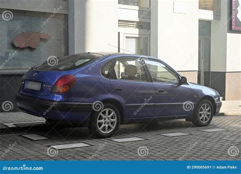 Old Veteran Popular Compact Dark Blue Car Toyota Corolla Parked