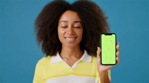 Black Woman Demonstrates Cellphone With Stock Footage Sbv 348614050