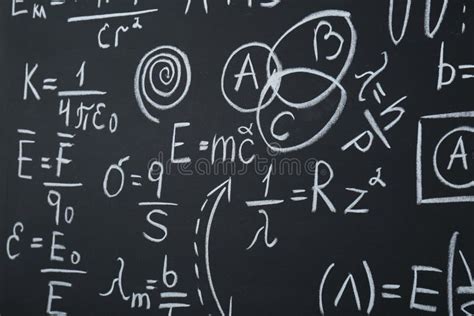Different Mathematical Formulas Written With Chalk On Blackboard Stock