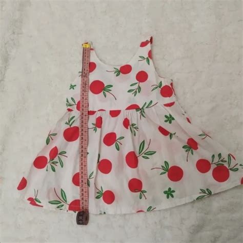 کمدا قیمت و خرید پیرهن مجلسی ، با کلاه ست رنگ سفید با توپ های قرمز پ