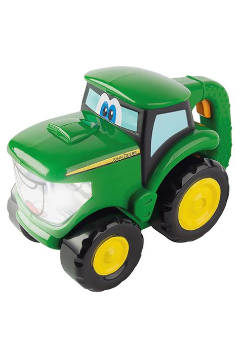 მწვანე ტრაქტორი განათებით დისფლეიში