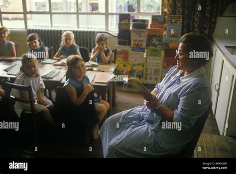 Village Primary School Uk 1980s School Teacher Reading To Class Of