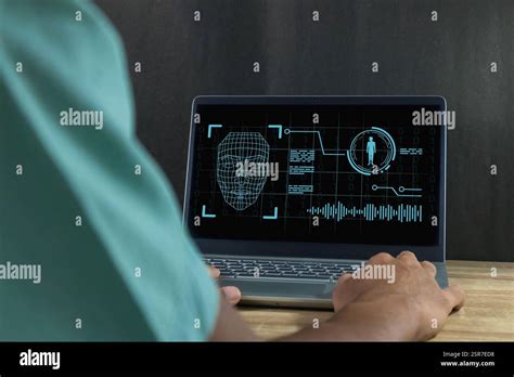 Deepfake And Artificial Intelligence Concept Man Using A Laptop To Create Convincing Fake Image