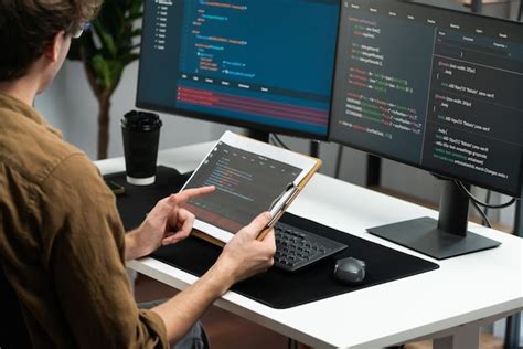 Premium Photo It Developer Working Online Software Development Coding On Pc Screens Gusher