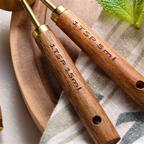 Комплект 4 броя мерителни лъжици с дървени дръжки Olele Bg