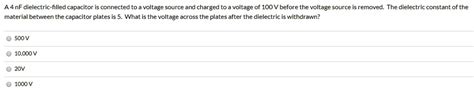 Solved A 4nf Dielectric Filled Capacitor Is Connected To A Voltage Source And Charged To A