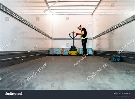 Worker Pallet Jack Loading Cargo Container Stock Photo 2437743199 Shutterstock