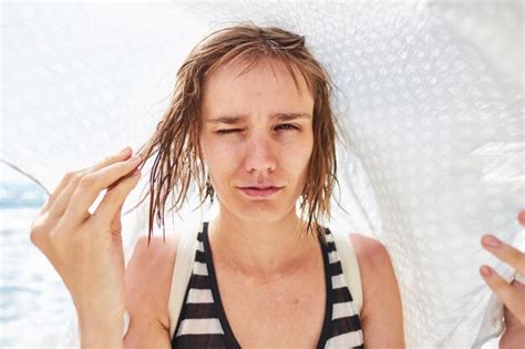 Premium Photo Close Up Portrait Of Girl With Wet Hair At Beach
