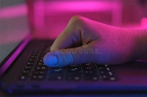 Person Typing At Laptop Computer At Night Female Uses Keyboard Shakes