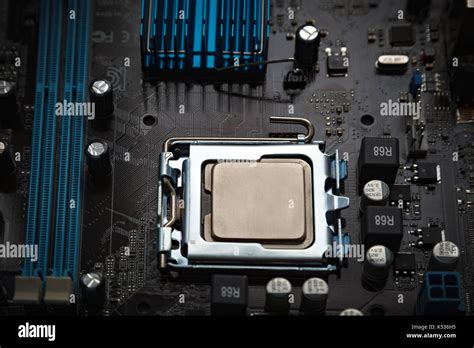 Integrated Microprocessor And Sockets On Circuit Of Computer Motherboard Stock Photo Alamy