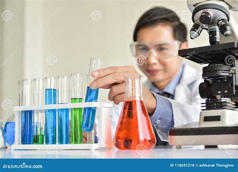 Research Scientist Is Using Micropipette Filling Test Tubes Stock Photo Image Of Doctor