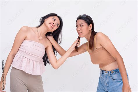 Two Young Women Fighting Pulling Each Others Hair Bitter Enemies In A