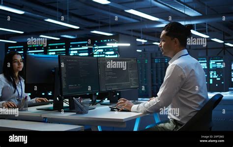 Engineer Overseeing Data Center Making Improvements And Updates To