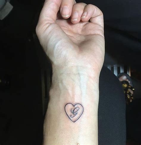 Cursive Letter G Tattoo