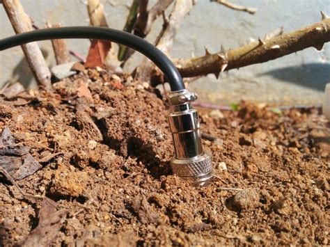 Adafruit Soil Humidity Sensor Installed In A Garden Connected To An