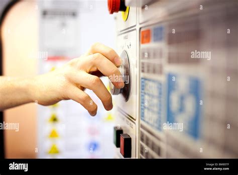 Male Hand Setting Controls On CNC Machine Stock Photo Alamy