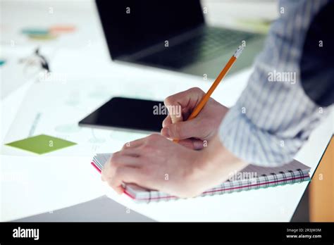 Team Of Entrepreneurs Developers Are Brainstorming Ideas On Notes Over Table With Documents