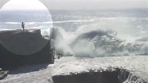 Stunning Video Captures Woman Being Swept Off Cliff By Massive Wave In