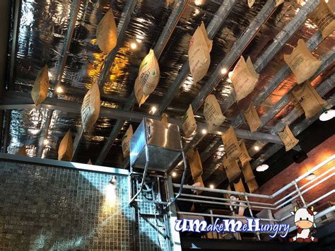 There Are Long Tables In The Cafe Suitable For Group Gathering Under The Cozy Lights And Air