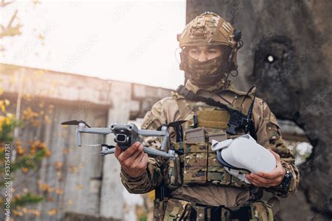 Modern Army Soldiers Using Aerial Drone For Artillery Guidance And Scouting View Enemy Positions